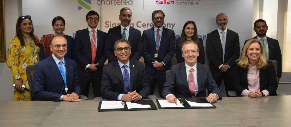 Standard Chartered signs MoU with British International Investment ...