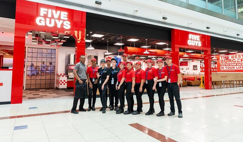 Five Guys unveils its largest branch at DXB Terminal 3 - Biz Today